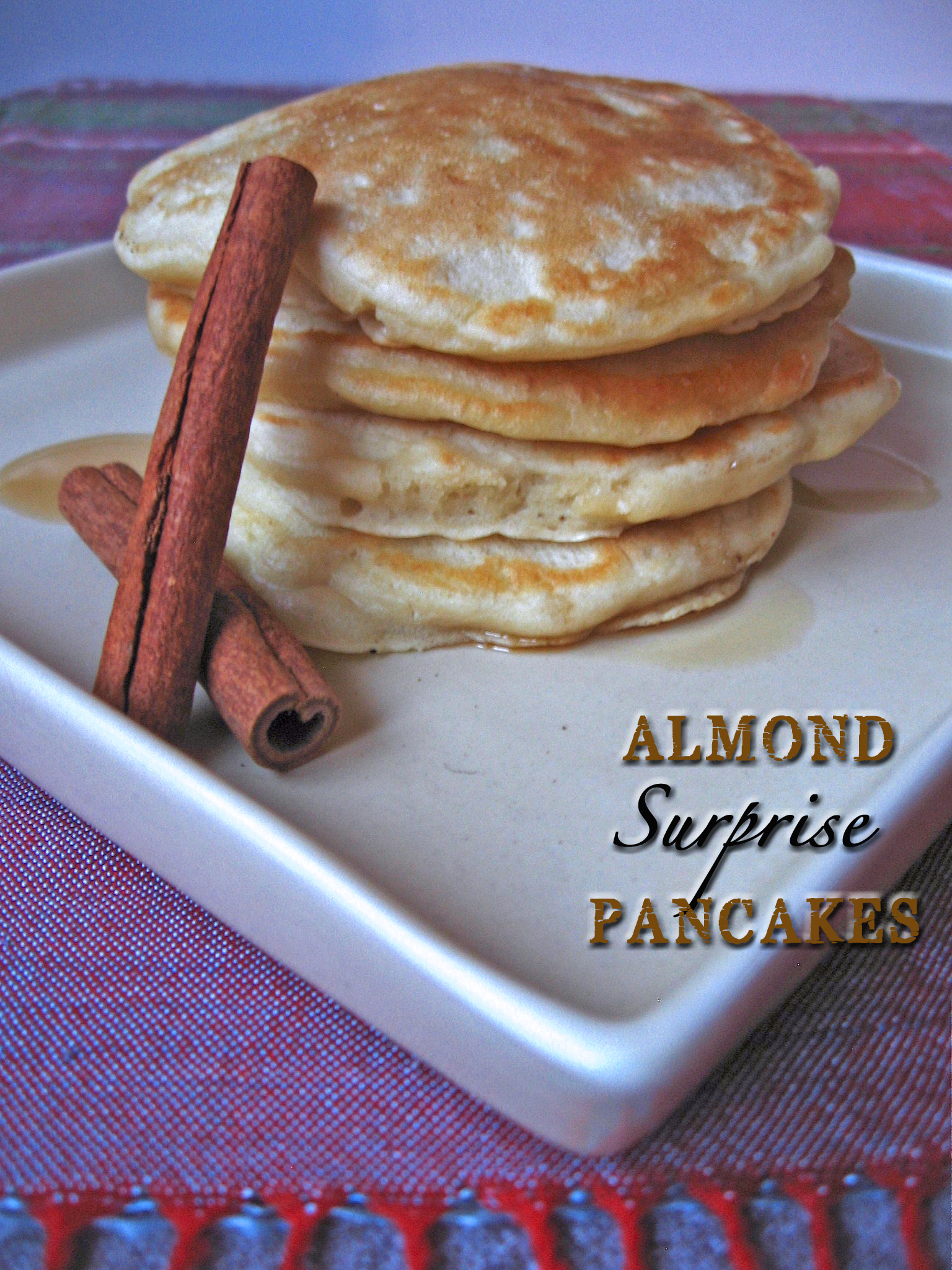 Almond Surprise Pancakes with Cinnamon Maple Syrup – Swirls and Spice