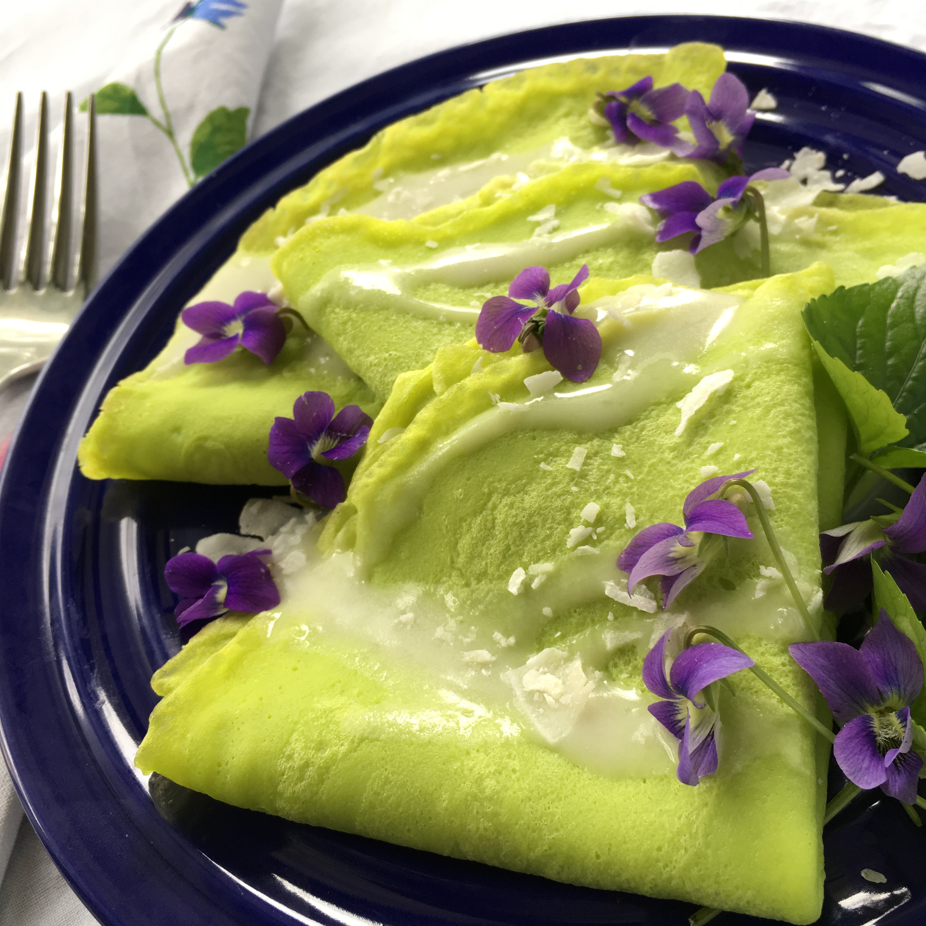Pandan Crepes with Coconut Sauce – Swirls and Spice